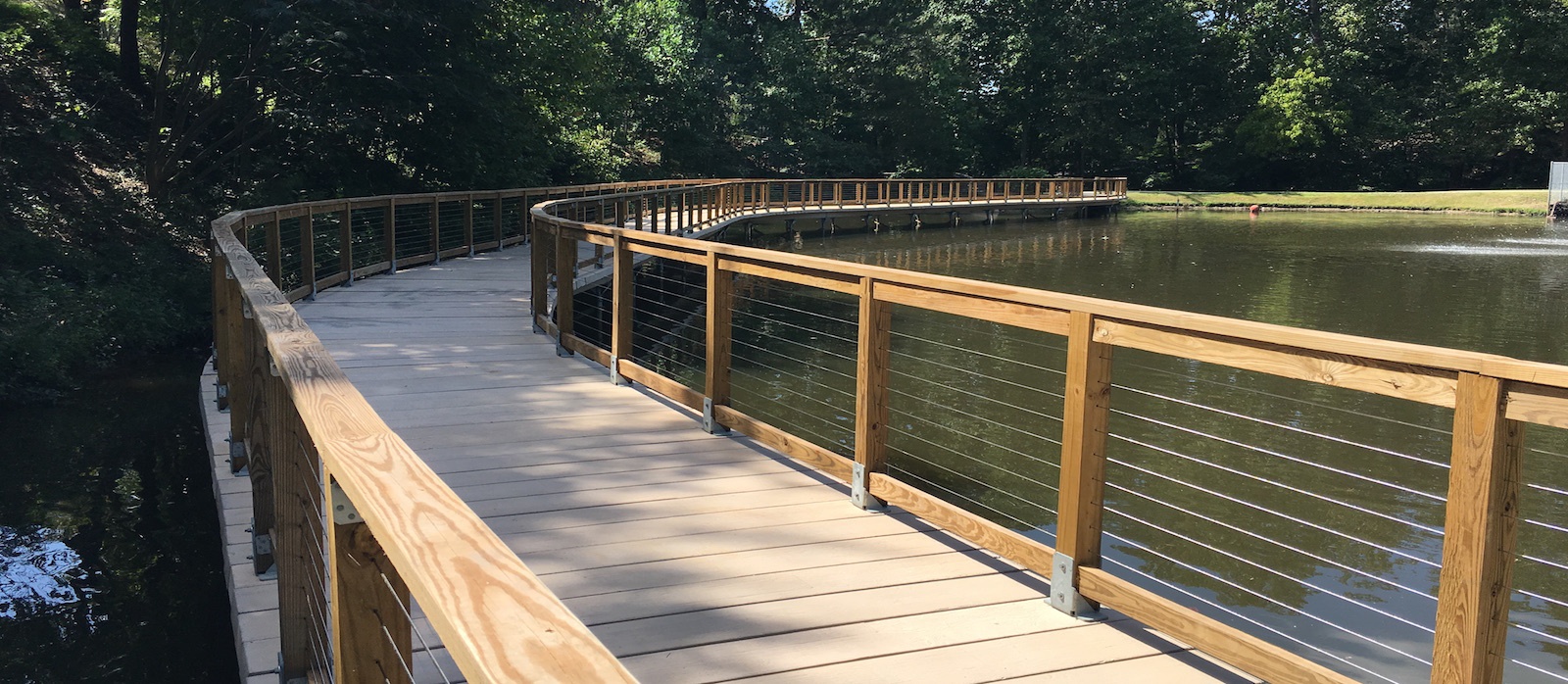 Envision Composite Decking vs PermaTrak Concrete Boardwalk