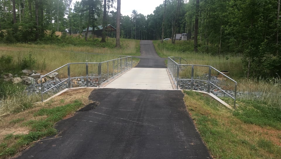 Pedestrian Bridge Design: Truss Bridge or Boardwalk System?