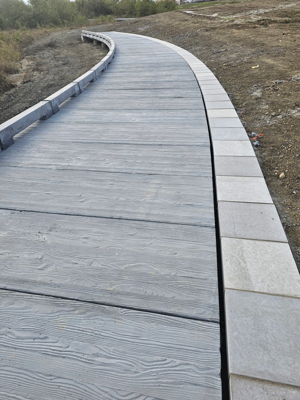 Design Considerations for Boardwalks on Steep Cross Slopes